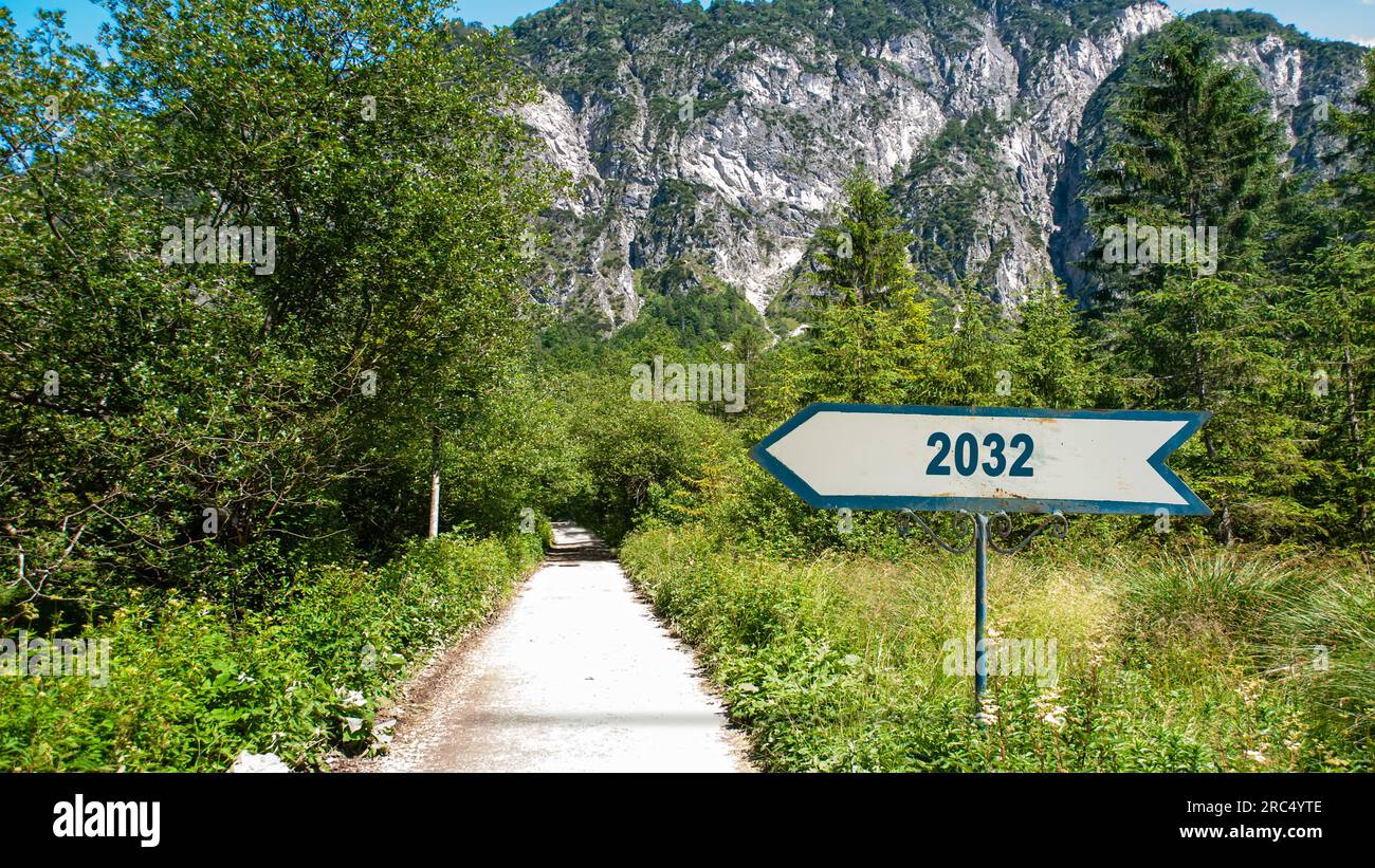 Image of a signpost pointing in the direction of the year 2032 Stock ...