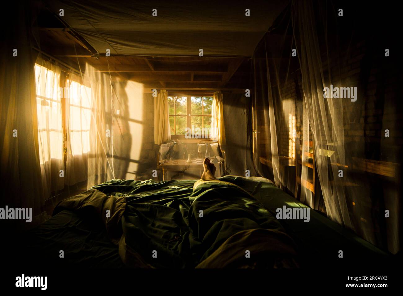 Anonymous person in bedroom hi-res stock photography and images - Alamy