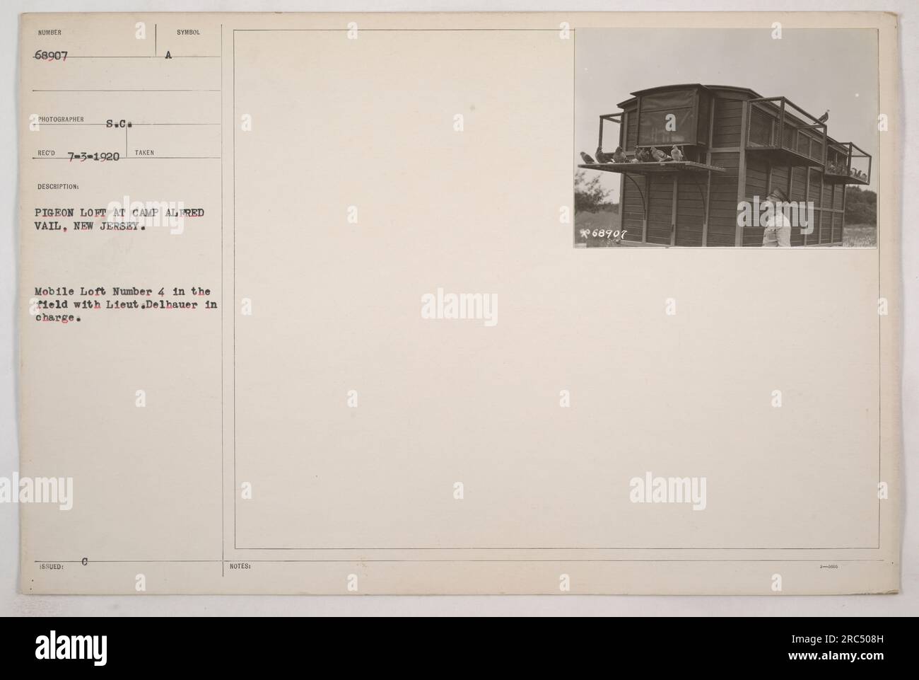 Lieutenant Delhauer in charge of Pigeon Loft Number 4 at Camp Alfred ...