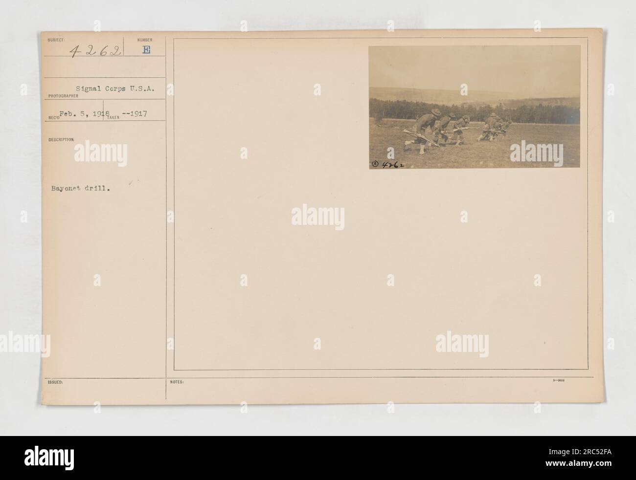 Soldiers practicing bayonet drills during World War One. This photograph was taken by the Signal ...