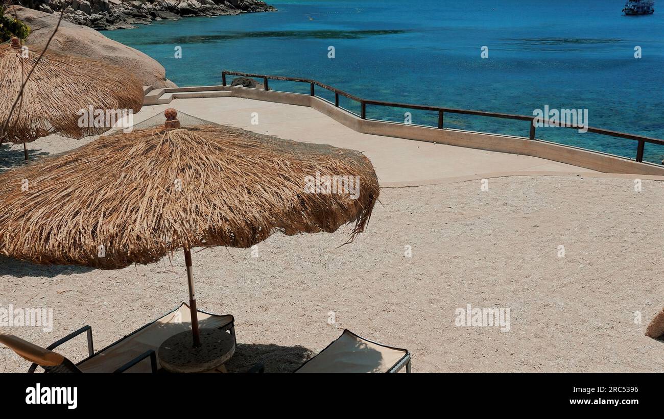 Enjoy day at beach in Mediterranean. Beach chair and umbrellas in ...