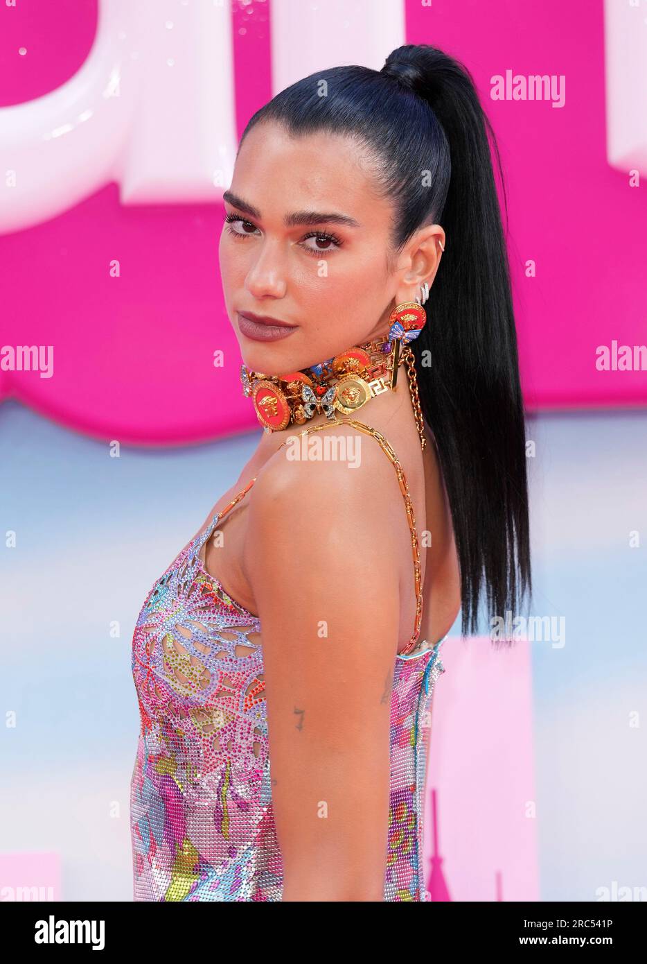 Dua Lipa poses for photographers upon arrival at the premiere of the ...