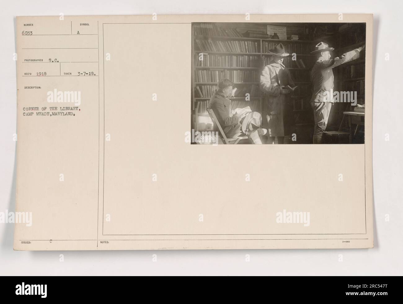 Soldiers gathered at the corner of the library in Camp Meade, Maryland ...