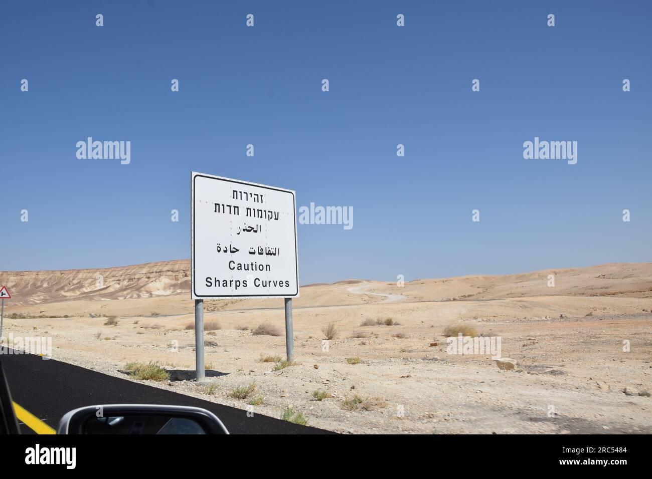 Curvy Road between Arad and Ein Bokek with Road Signs - Lower Basin of the Dead Sea Stock Photo ...