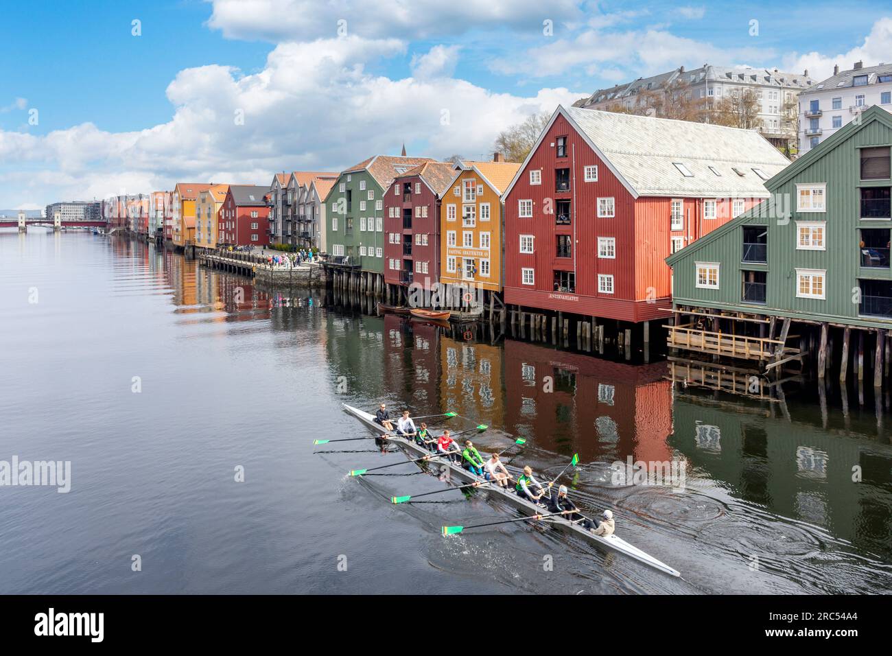 Colourful 17th century warehouses across Nidelva River from Old Town ...