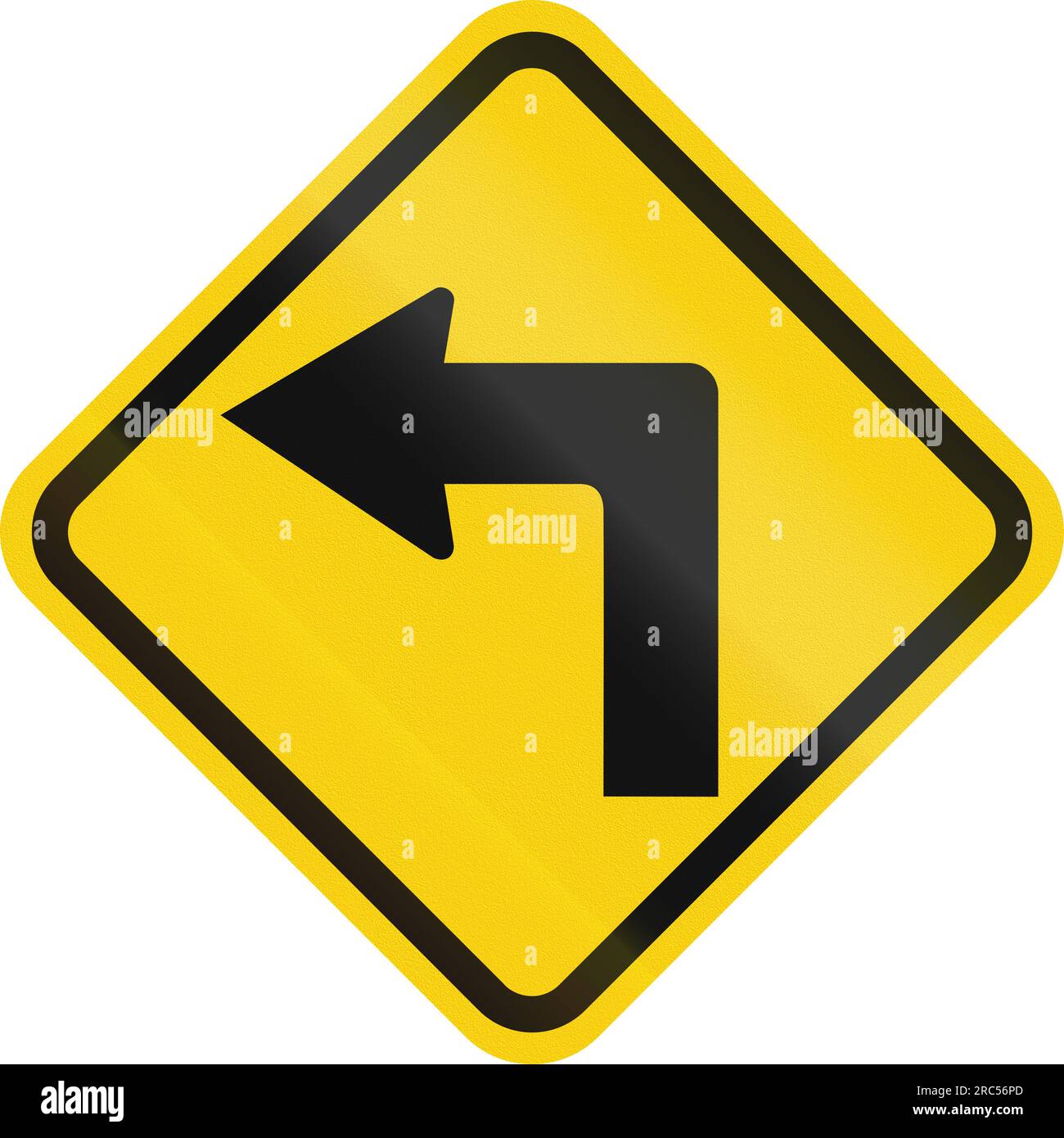 Colombian road warning sign: Left curve ahead Stock Photo - Alamy