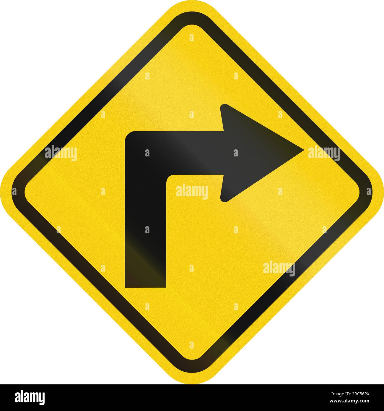 Colombian road warning sign: Right curve ahead Stock Photo - Alamy