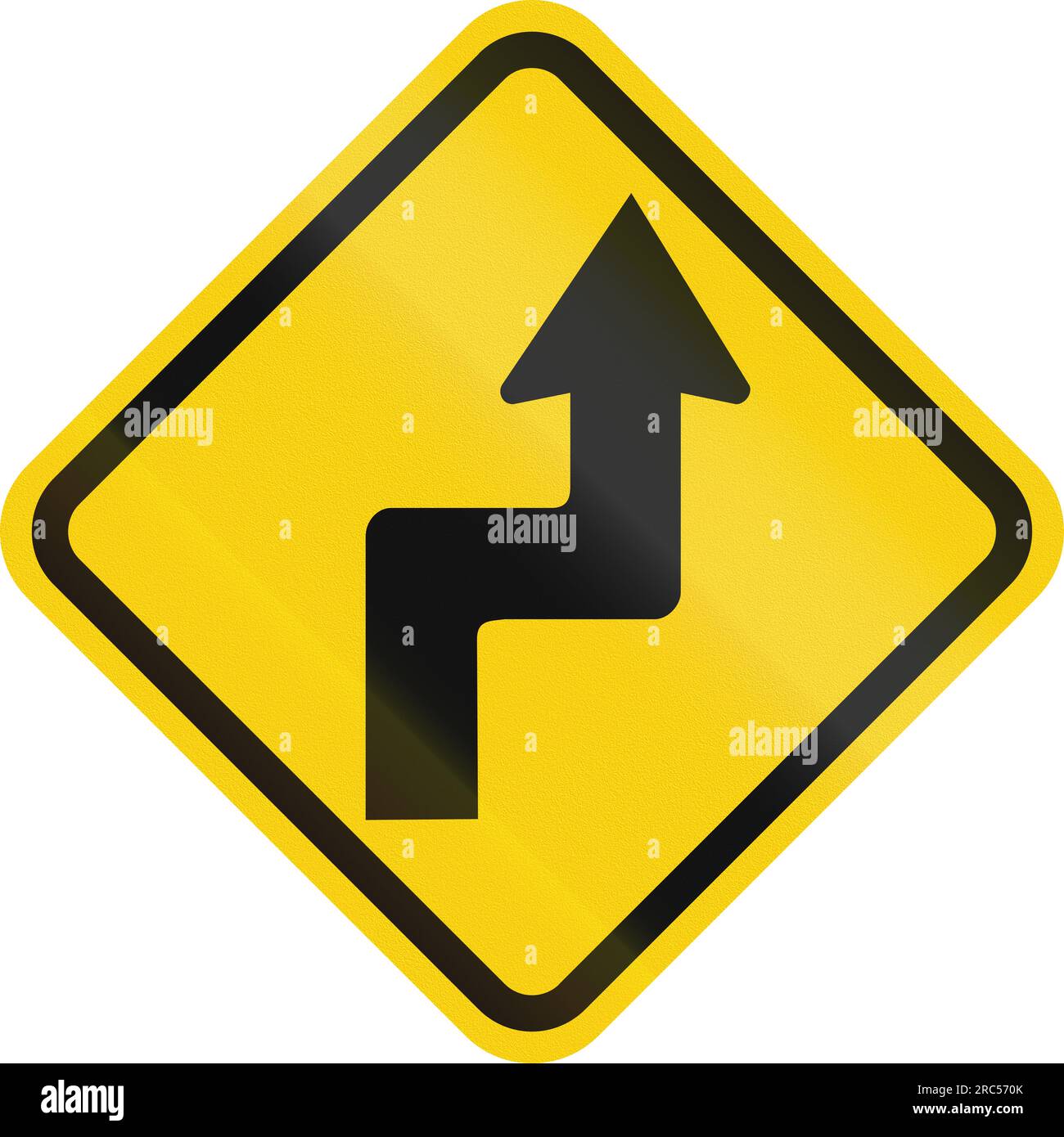 Colombian road warning sign: Reverse turn Stock Photo - Alamy