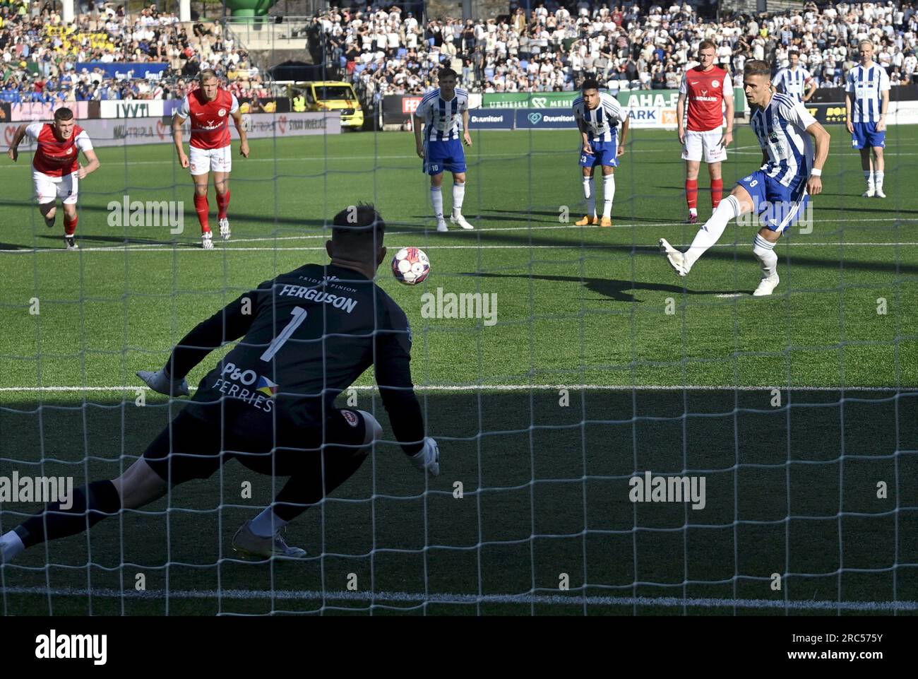 Helsinki, Finland. 12th July, 2023. Bojan Radulovic (R) of HJK scores ...