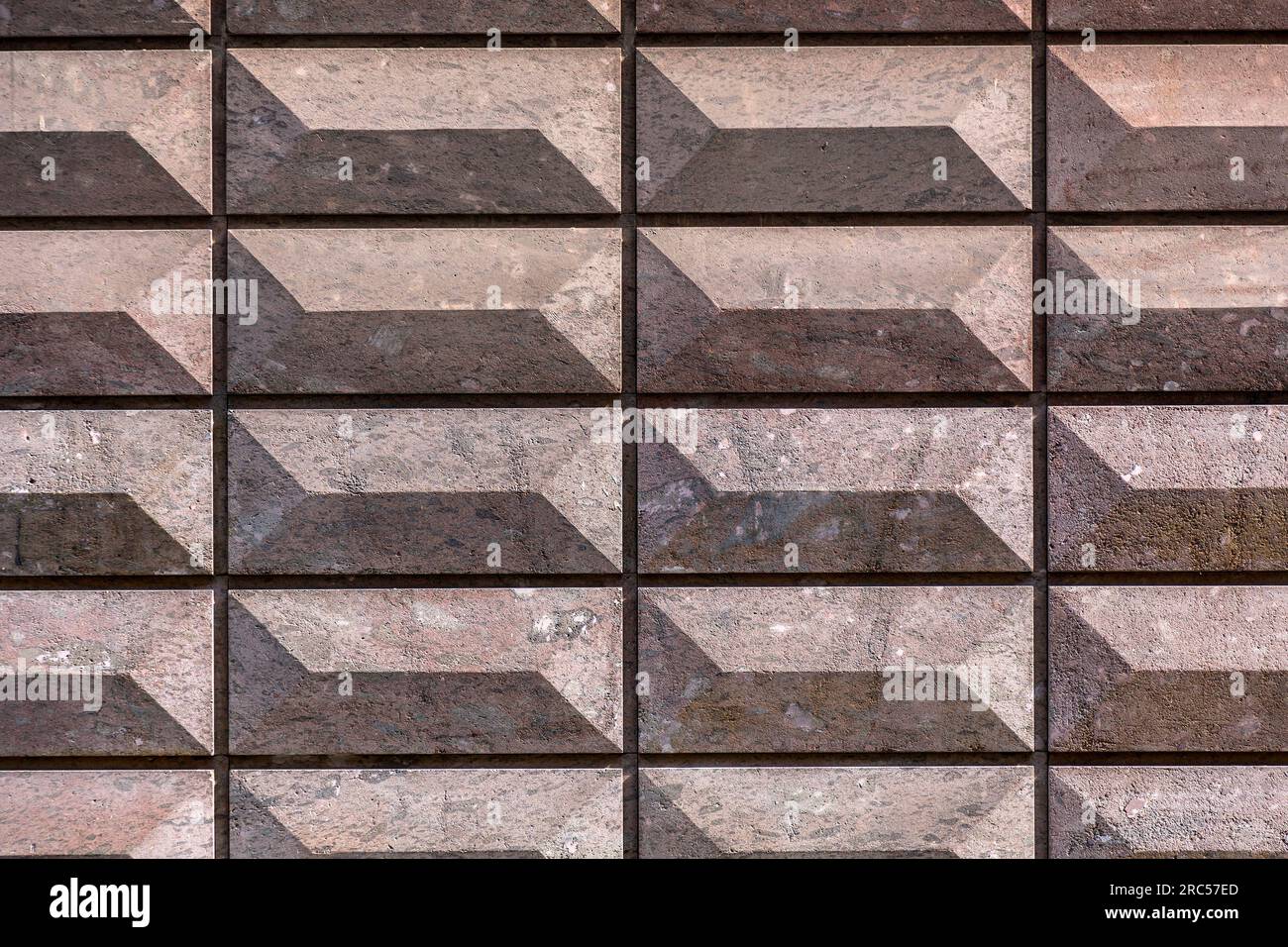 Rectangular bas relief stone tiled blocks close up texture background ...
