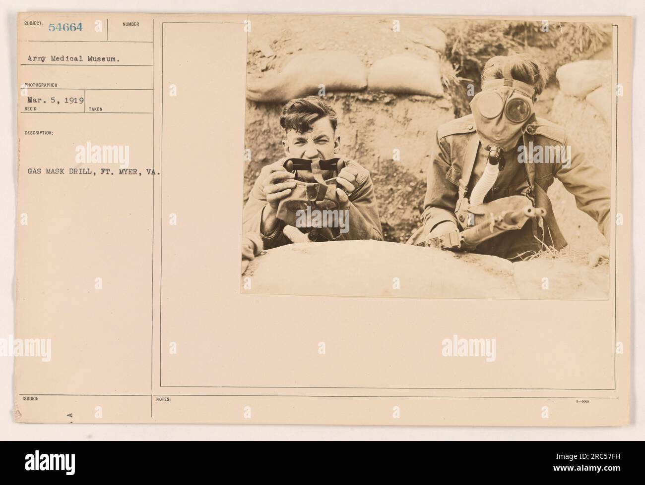 Soldiers participating in a gas mask drill at Fort Myer, Virginia. This ...