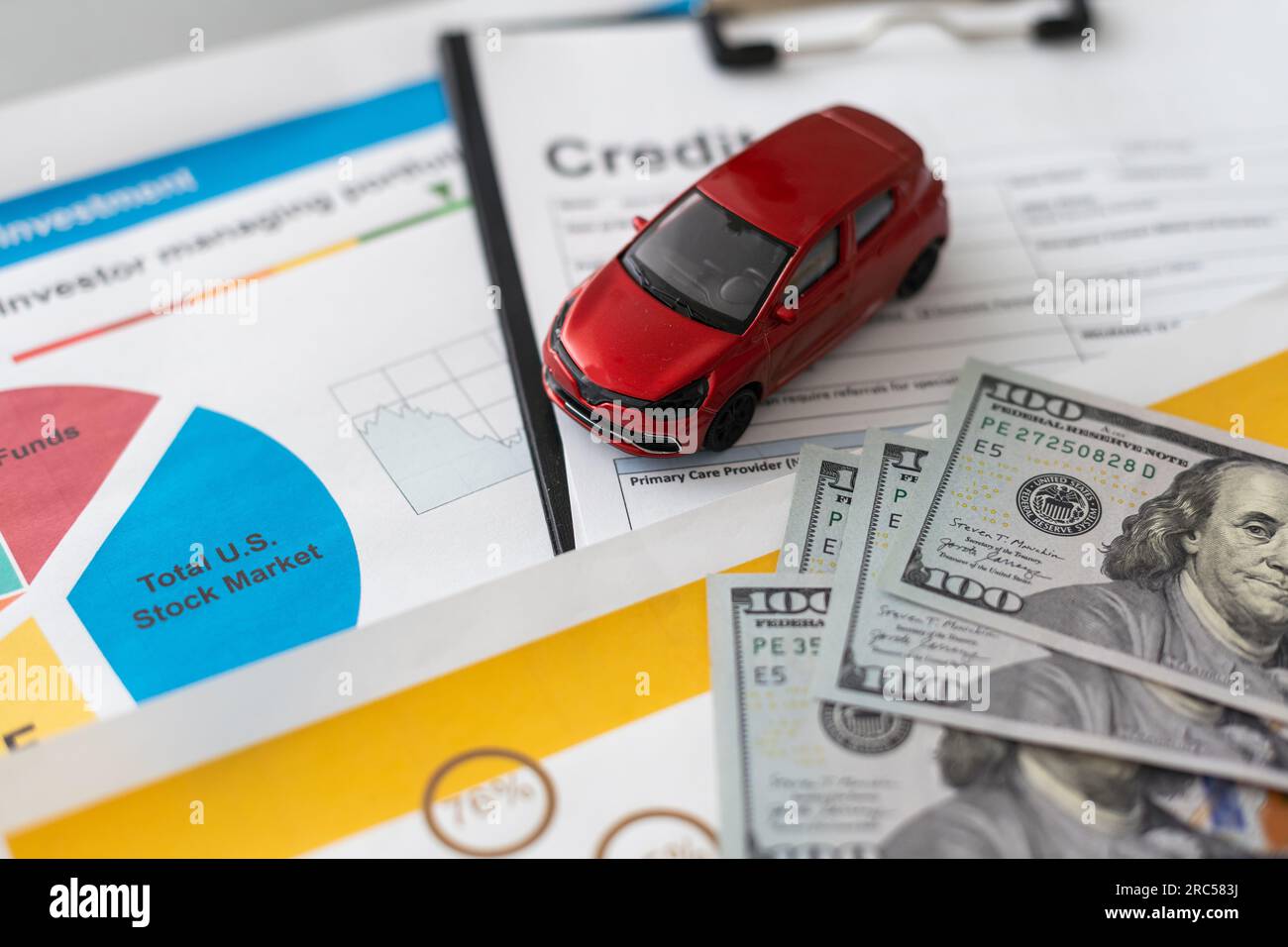 Fair credit score report with pen and keyboard; document is mock-up ...