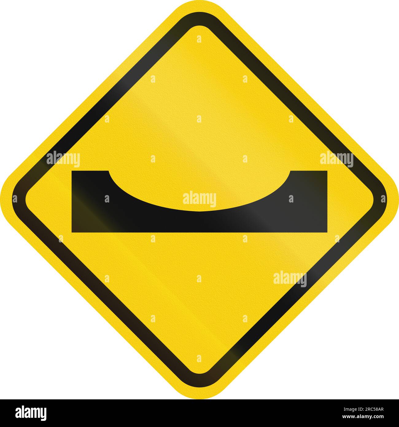 Colombian road warning sign: Dip Stock Photo - Alamy