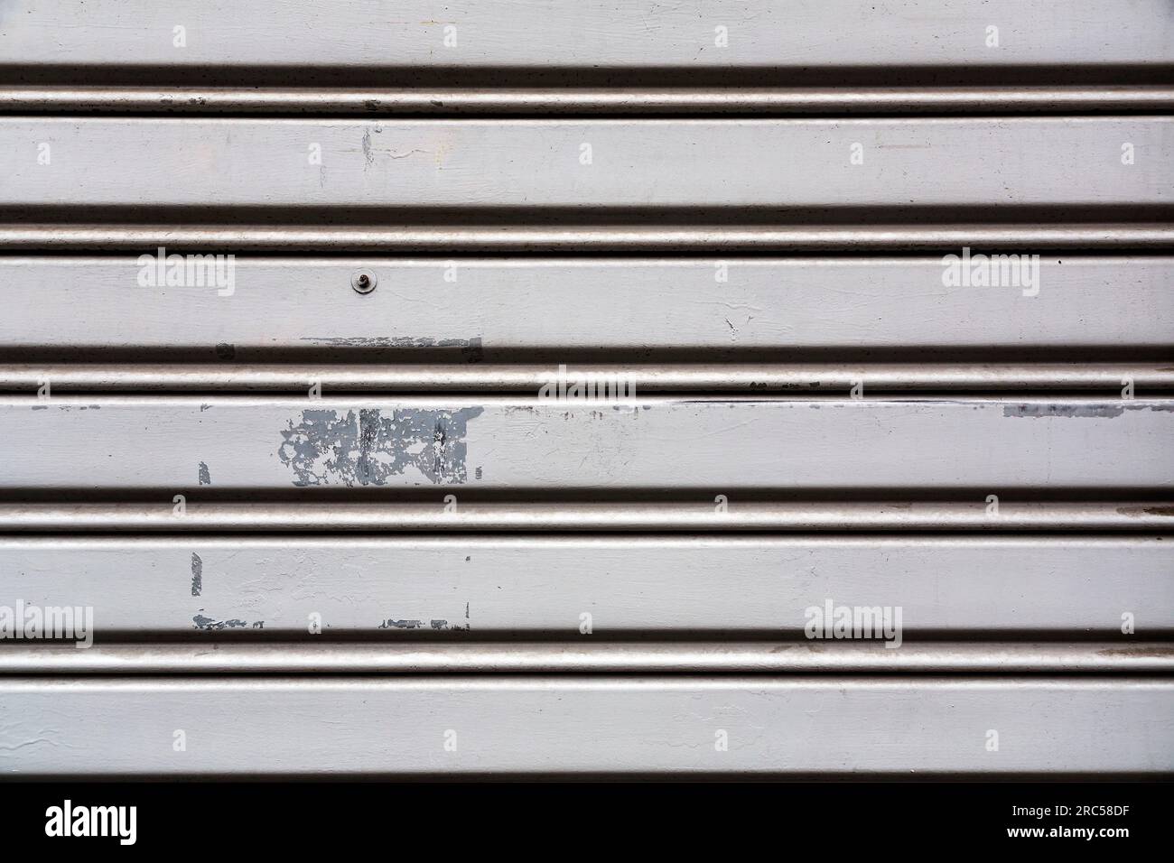 Grunge metal garage door texture background, distressed fragment close ...