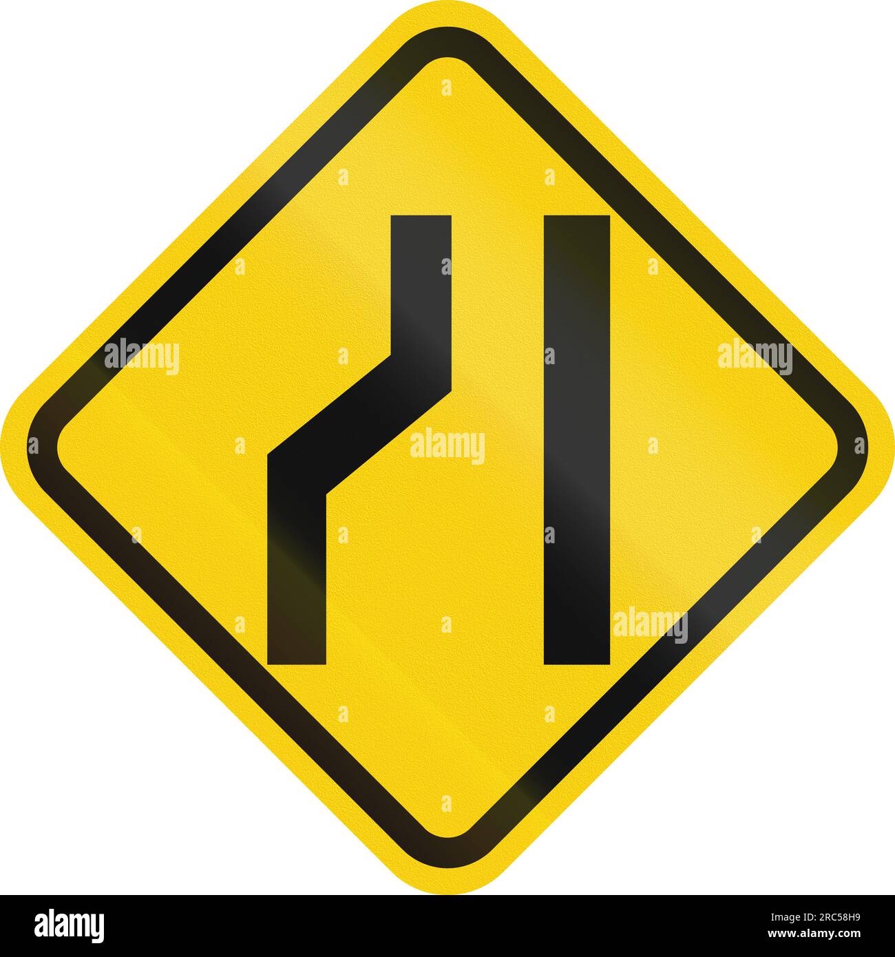Colombian road warning sign: left lane ends or road narrows from the ...