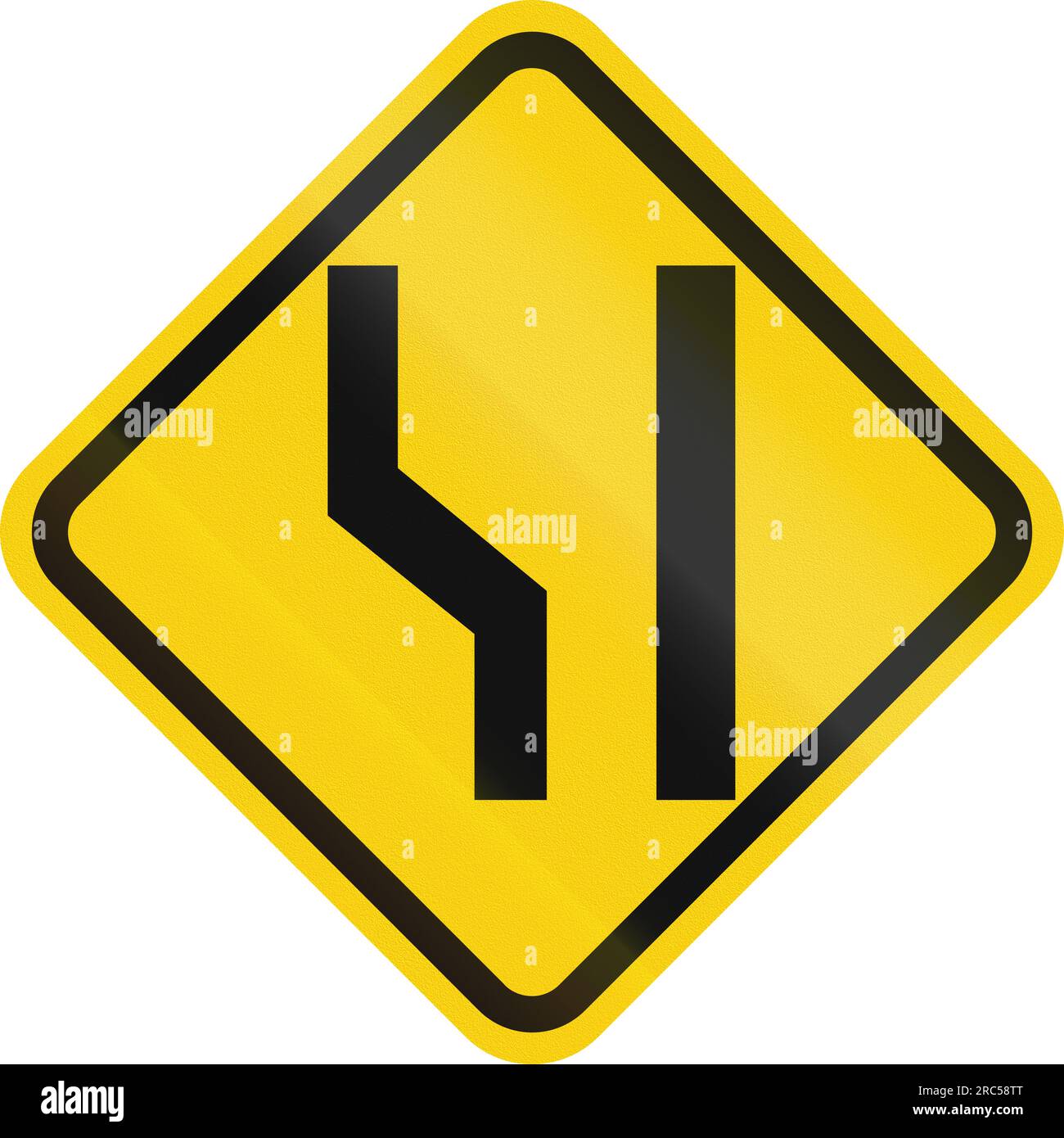 Colombian road warning sign: Road widens on the left Stock Photo - Alamy