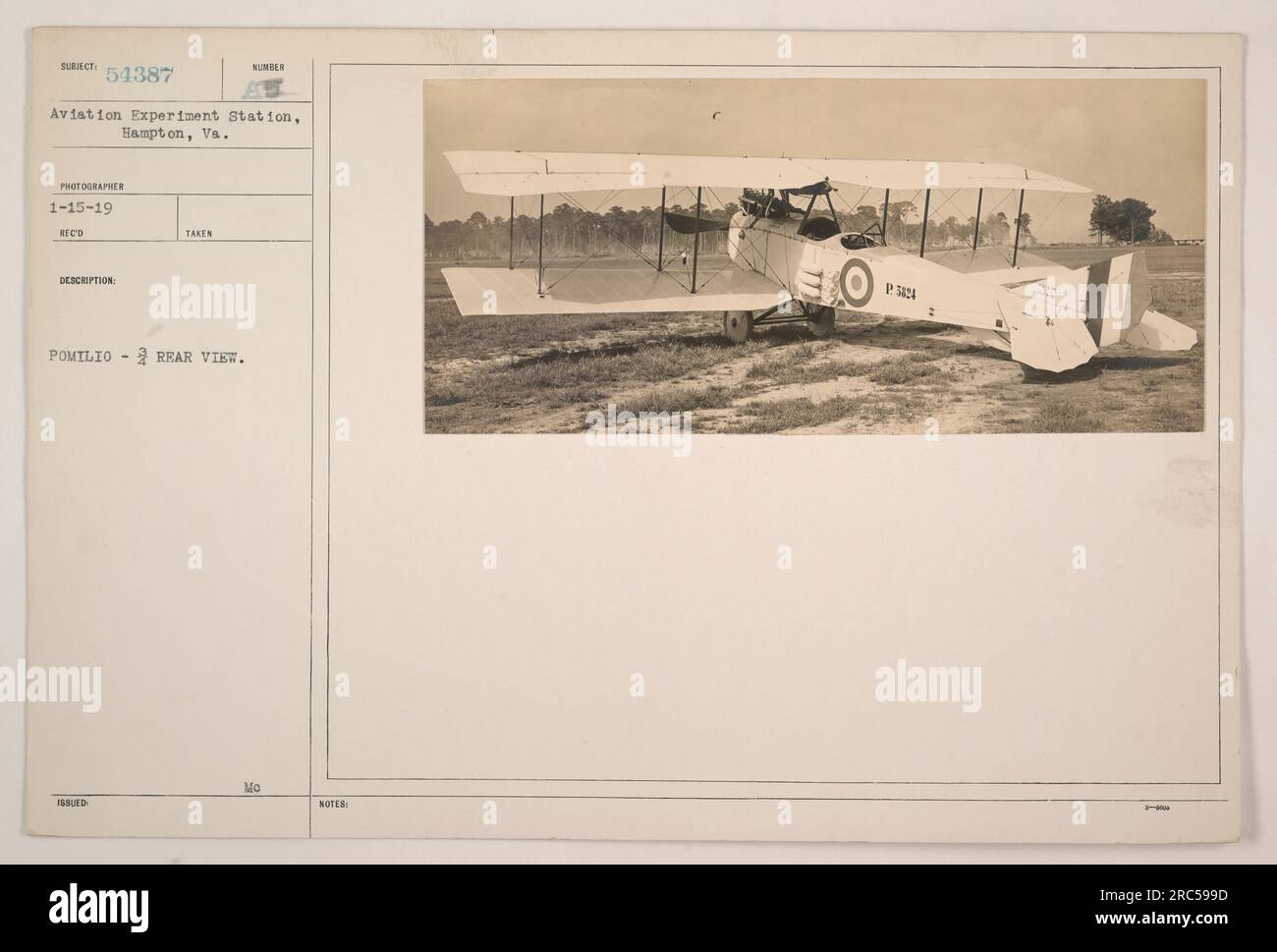 The photograph captures a Pomilio aircraft in a 3/4 rear view at the ...