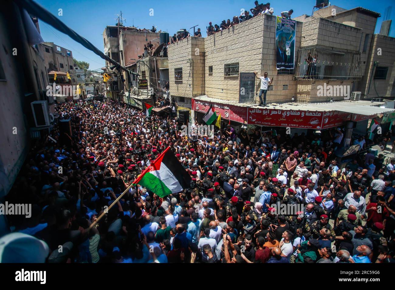 Jenin, Palestine. 12th July, 2023. People gather to receive the ...