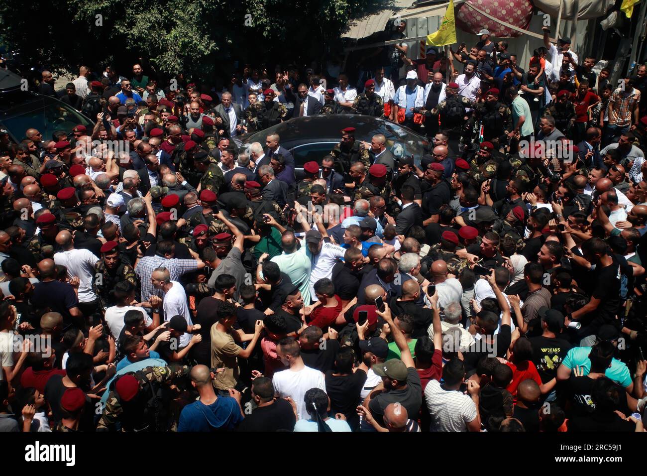 Jenin, Palestine. 12th July, 2023. People gather to receive the ...