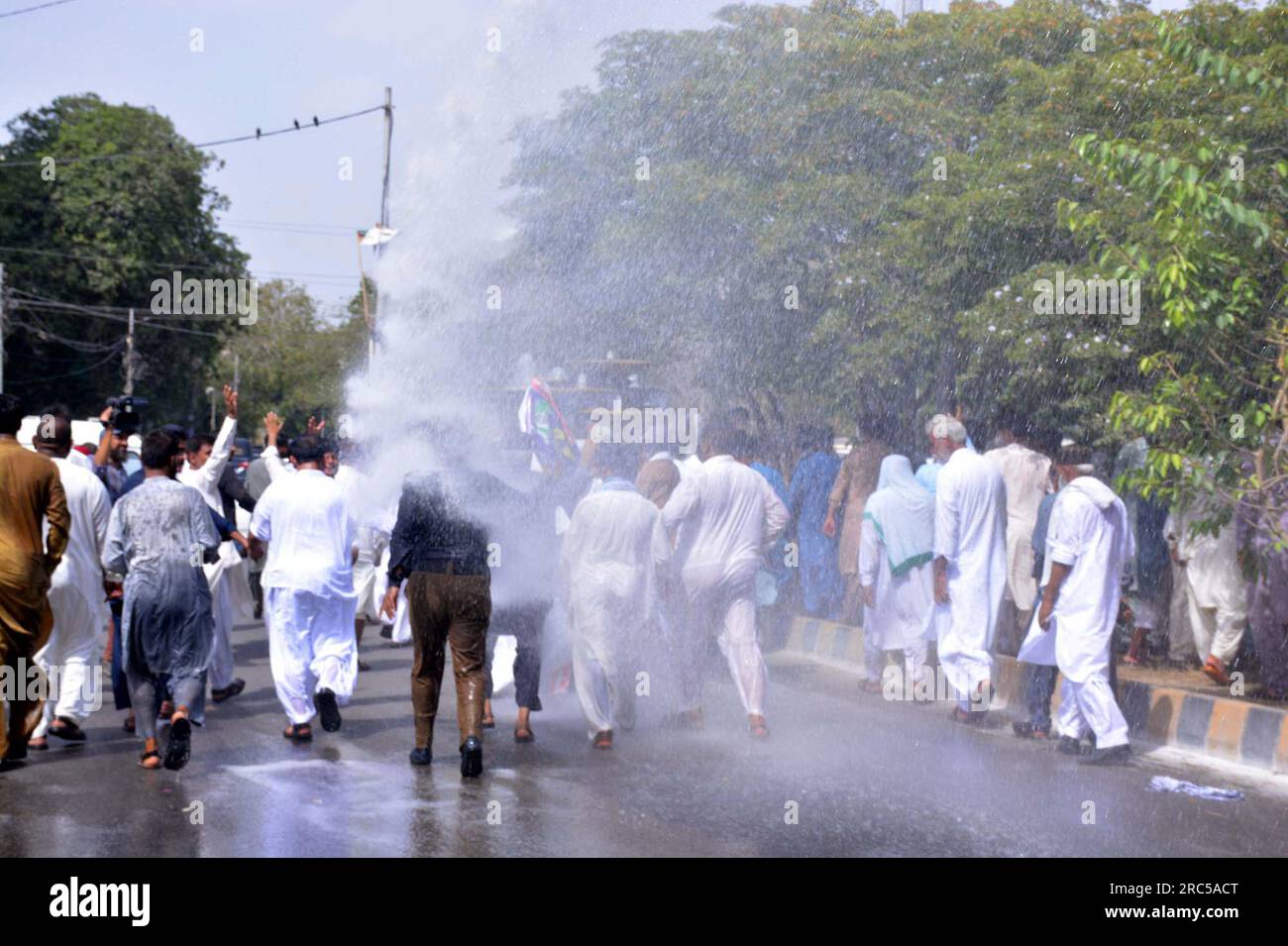 Hyderabad, Pakistan, July 12, 2023. Security officials restore baton ...