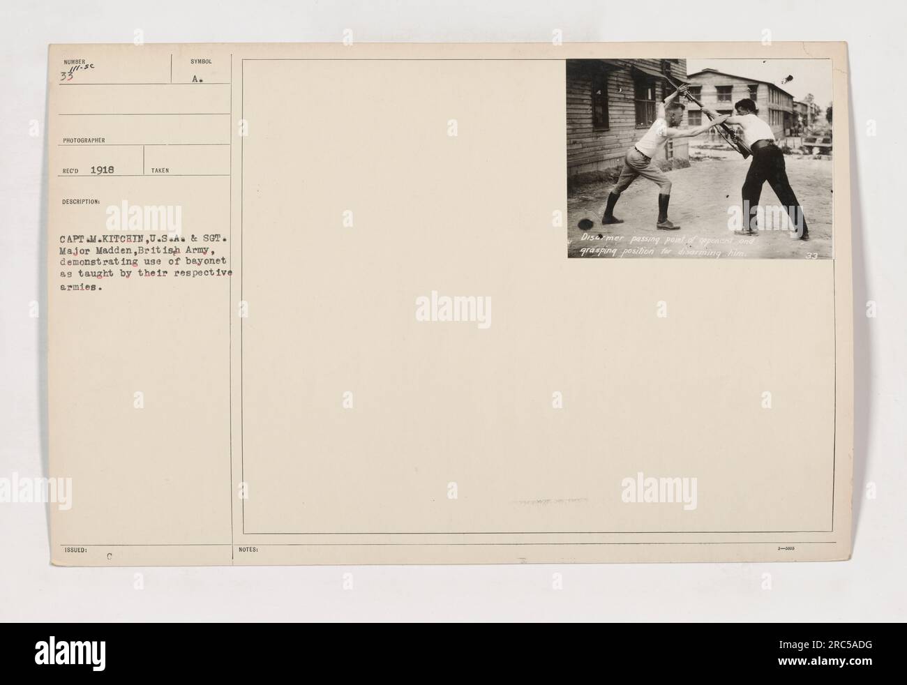 Caption: Capt. Mills Kitchen (USA) and Sgt. Major Madden (British Army ...