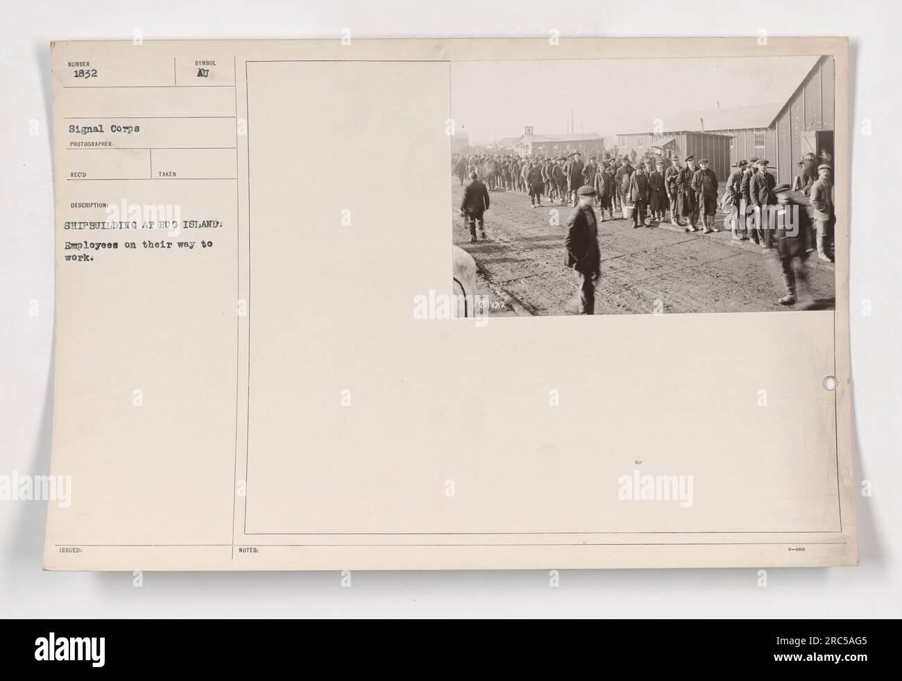 A group of employees at Hog Island shipyard heading to work during ...