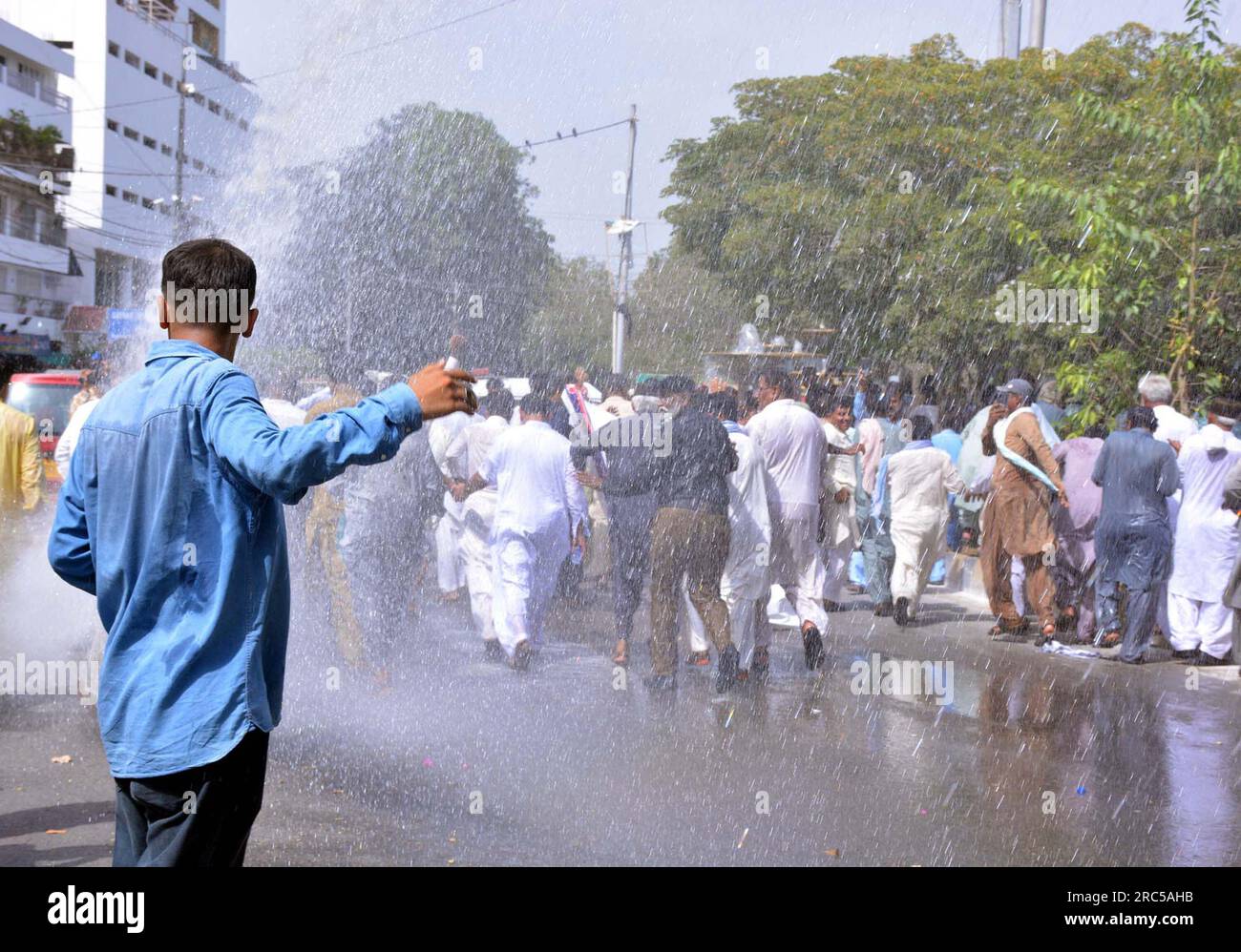 Hyderabad, Pakistan, July 12, 2023. Security officials restore baton ...