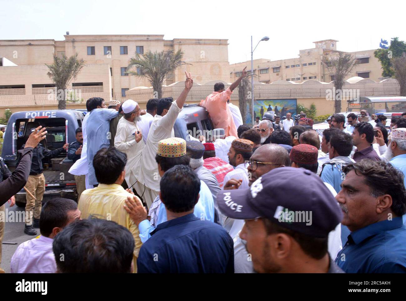 Hyderabad, Pakistan, July 12, 2023. Security officials restore baton ...