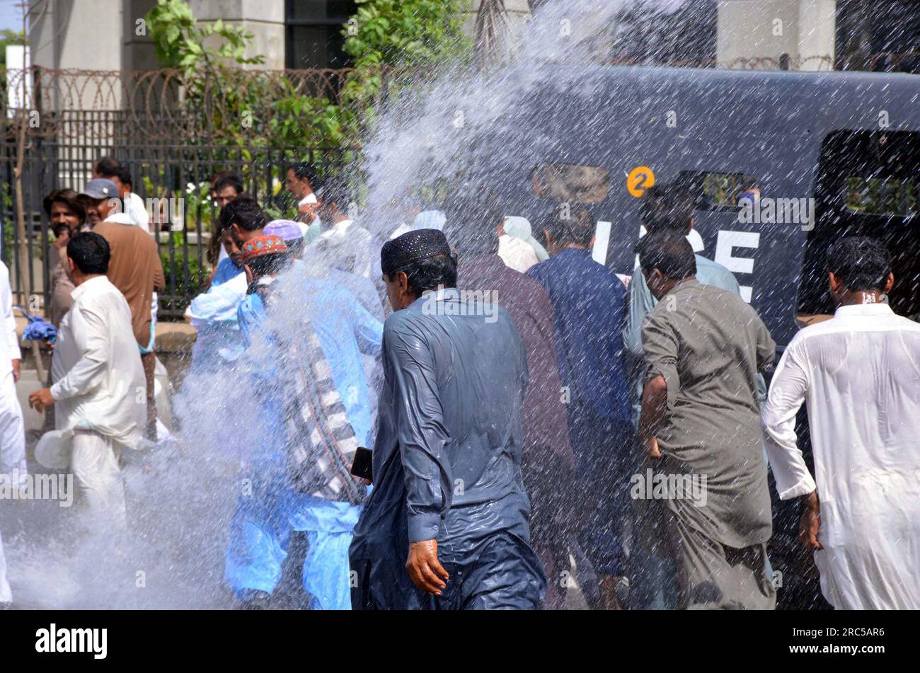 Hyderabad, Pakistan, July 12, 2023. Security officials restore baton ...