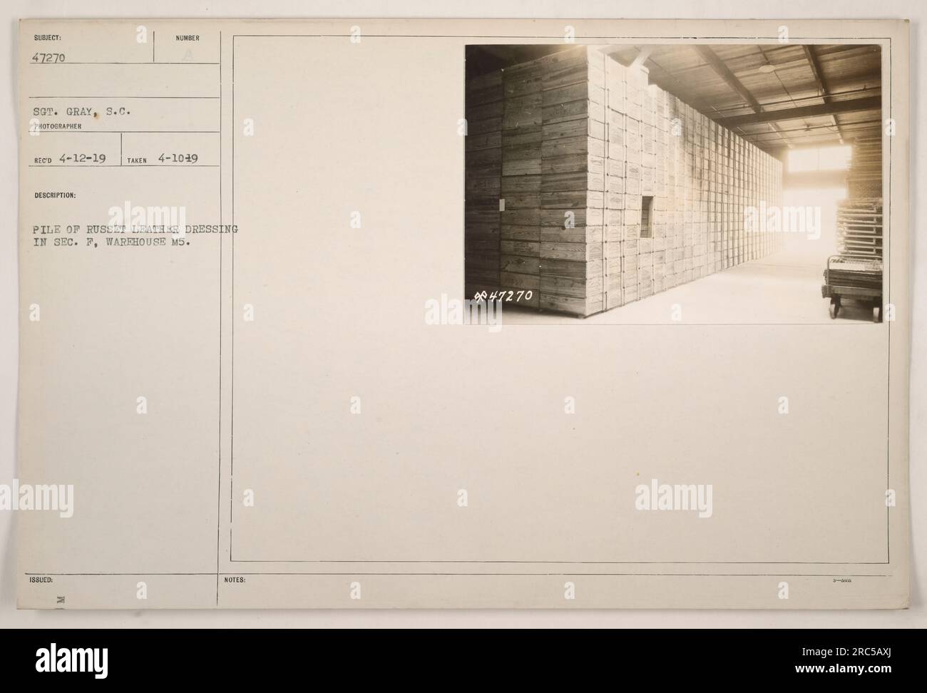 A stack of russet leather dressing is seen in a warehouse labeled SEC ...