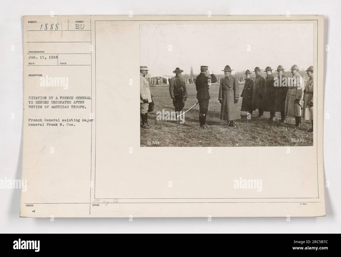 A French General salutes Major General Frank W. Coe at a ceremony where ...