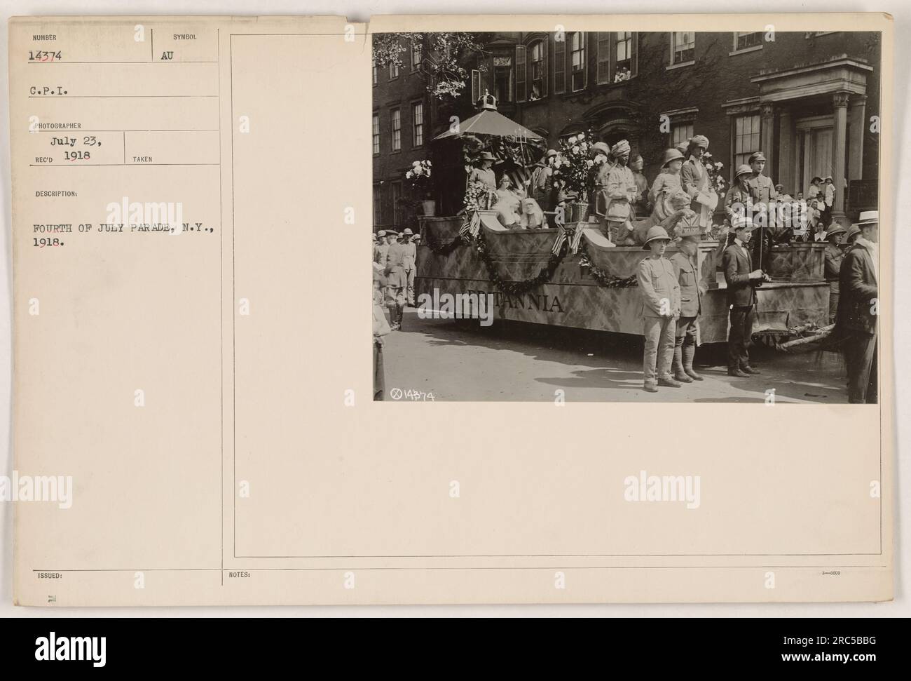 Soldiers and citizens marching in a Fourth of July parade in New York ...