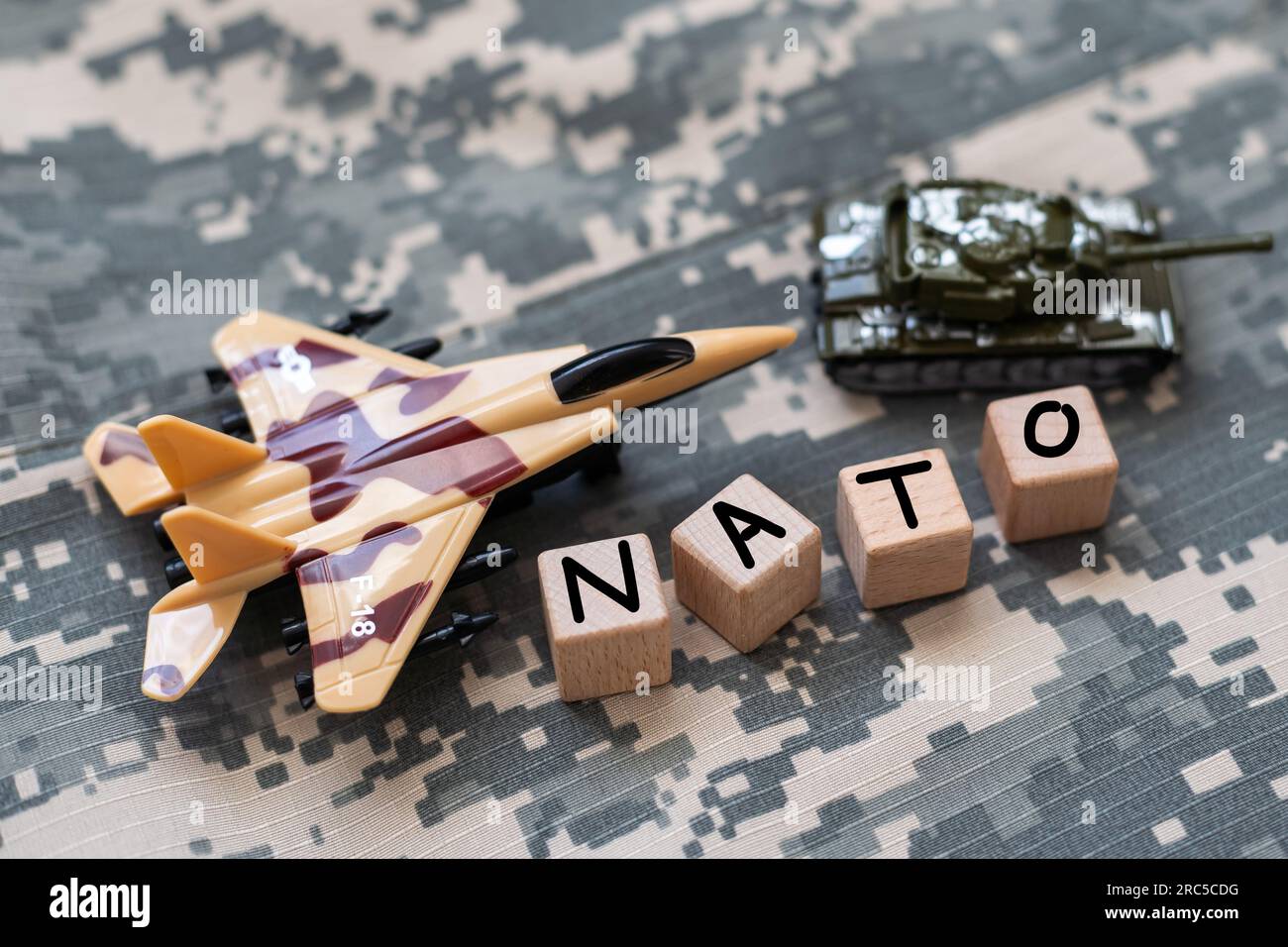 Military NATO Word In Wooden Cube Stock Photo - Alamy
