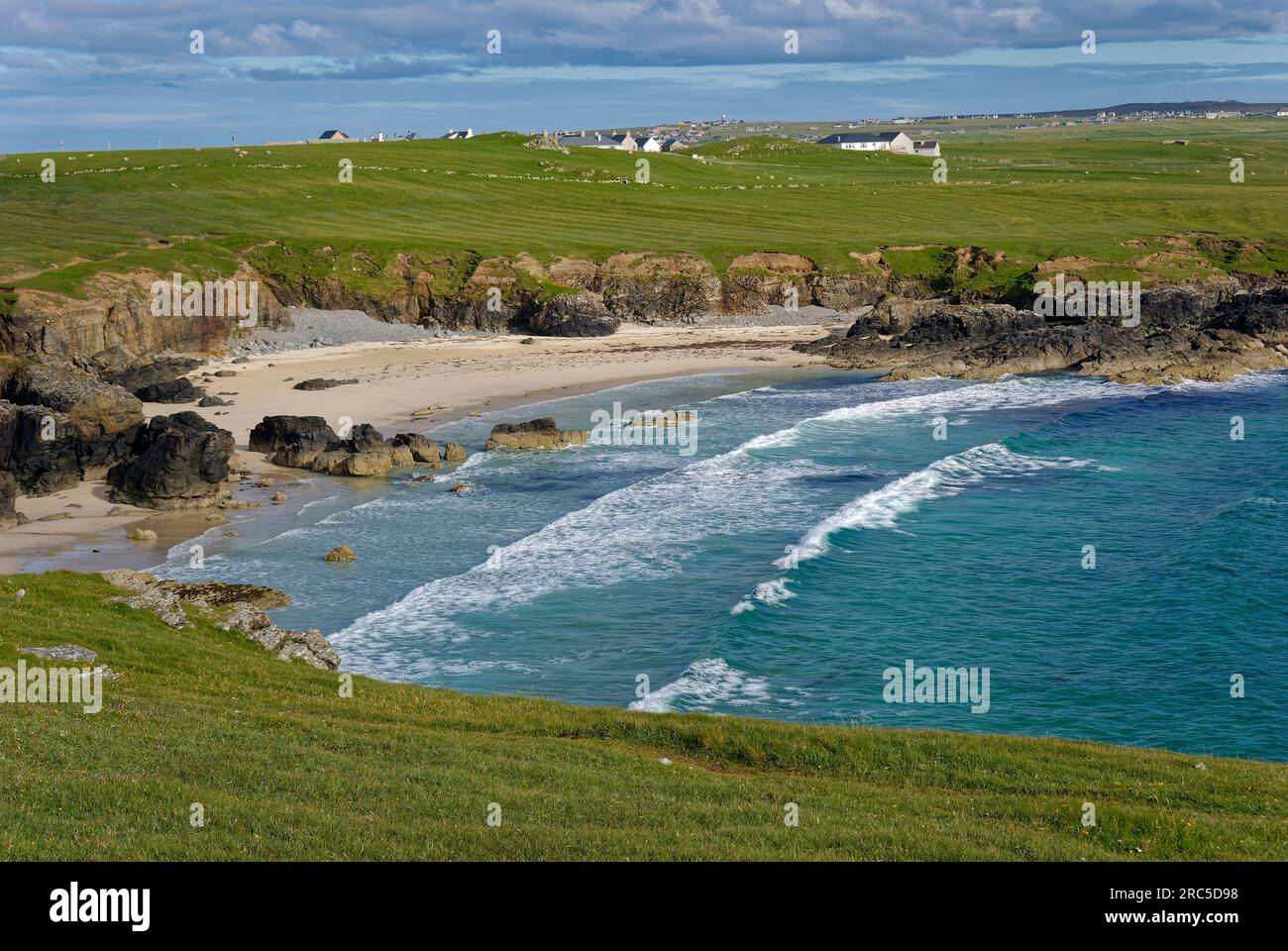 Stacks of waves in the clear water of Cunndal Beach near to the ...