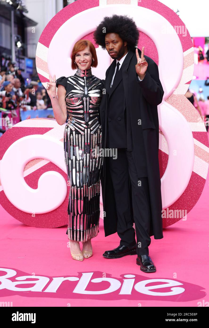 Hari Nef, left, and Jeremy O. Harris pose for photographers upon ...