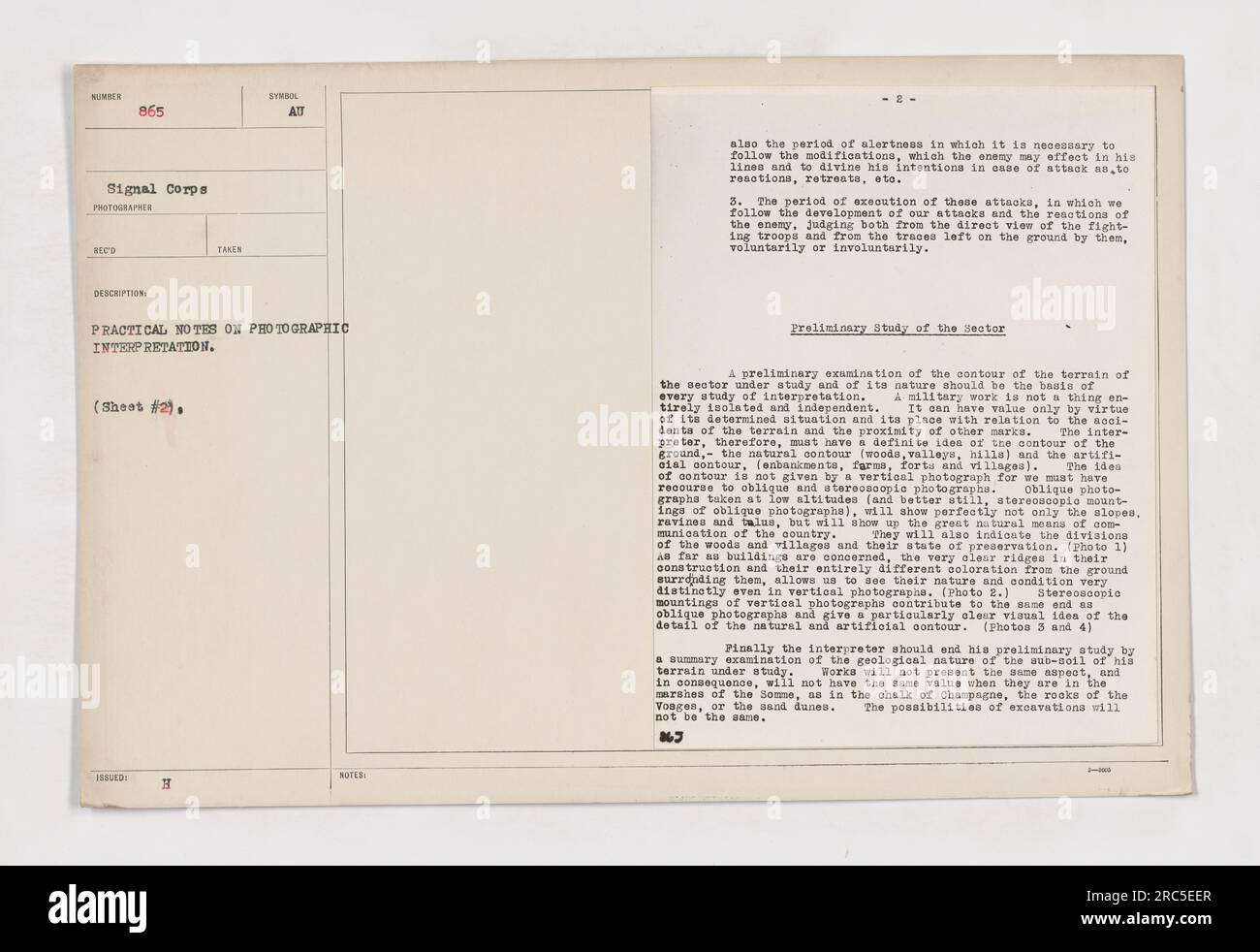 Soldiers studying and making practical notes on photographic ...