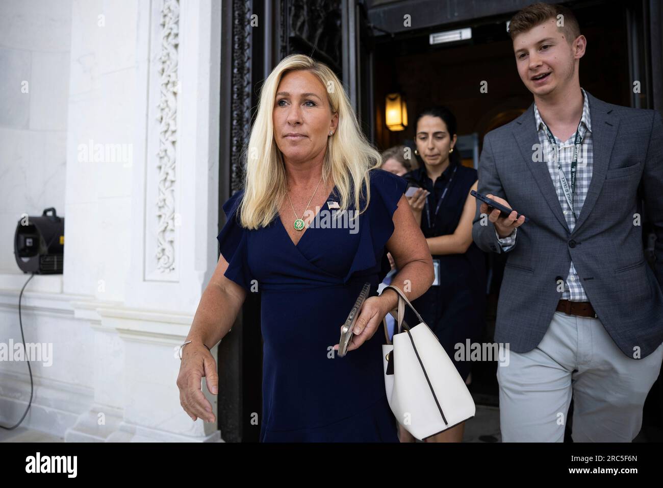 Rep. Marjorie Taylor Greene (R-Ga.) speaks with reporters as she ...
