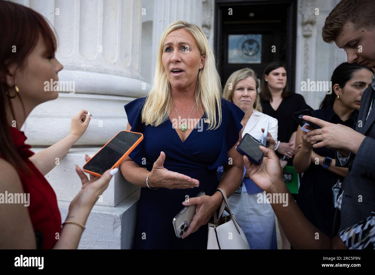 Rep. Marjorie Taylor Greene (R-Ga.) speaks with reporters as she ...