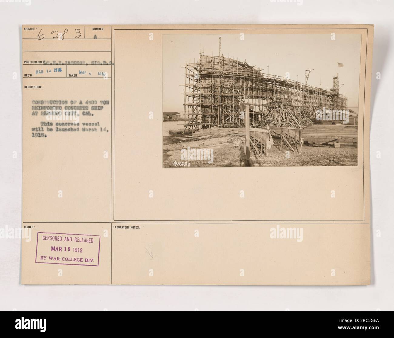 Construction of a 4500-ton reinforced concrete ship underway at Redwood ...