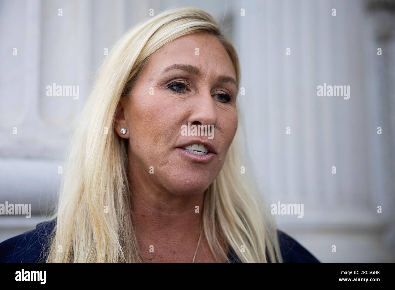 Rep. Marjorie Taylor Greene (R-Ga.) speaks with reporters as she ...