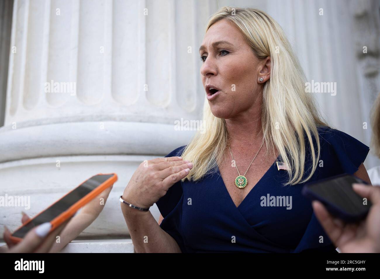 Rep. Marjorie Taylor Greene (R-Ga.) speaks with reporters as she ...