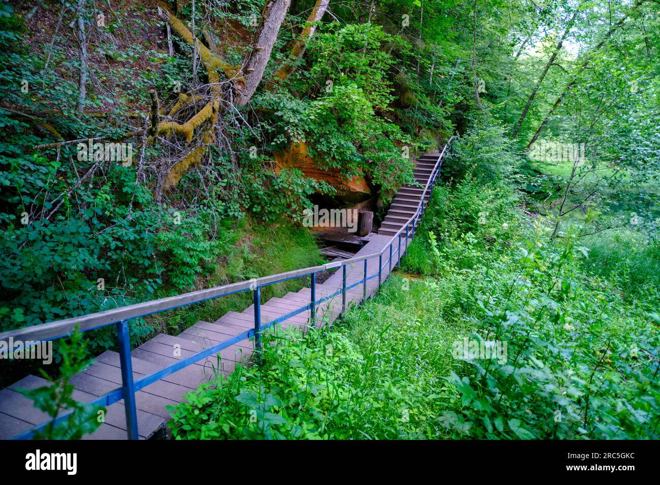 Place of natural water source. installed water intake point. a trail ...