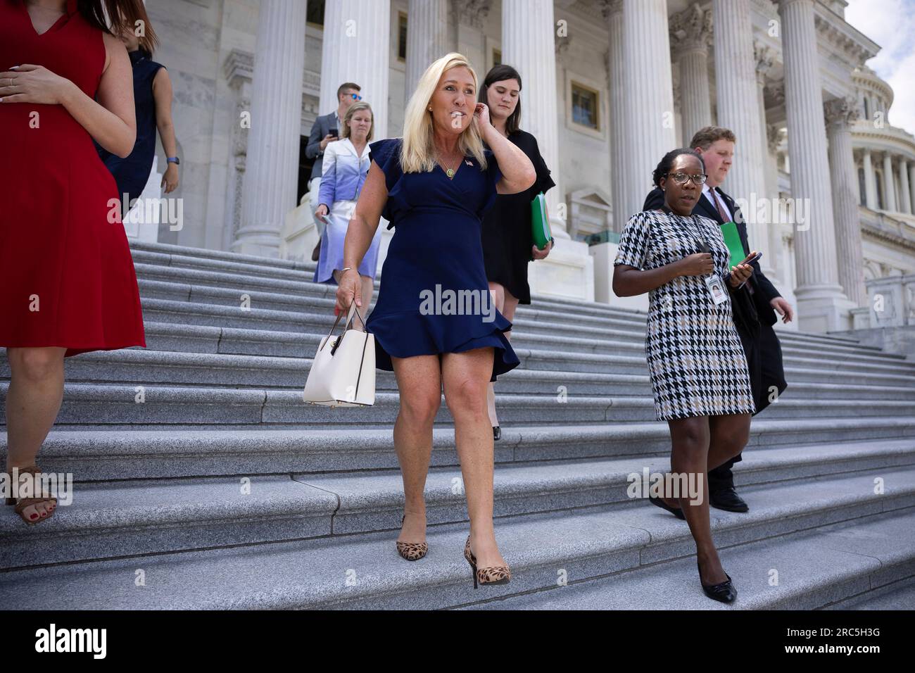 Rep. Marjorie Taylor Greene (R-Ga.) speaks with reporters as she ...