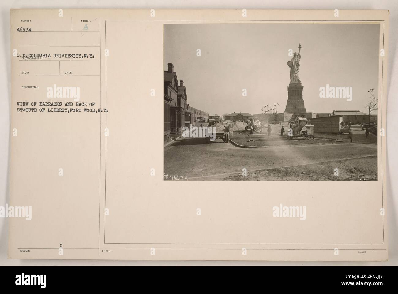 Barracks buildings can be seen with the back of the Statue of Liberty ...