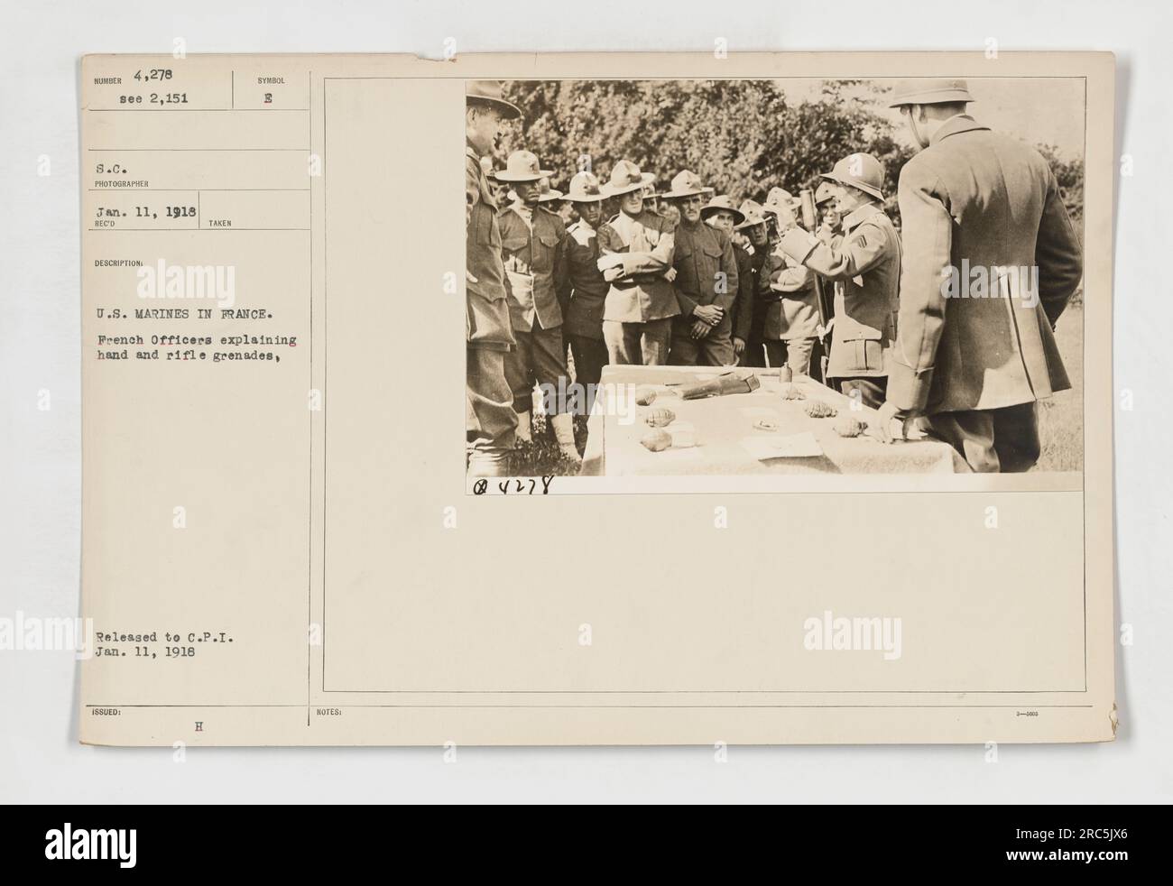 French officers explaining hand and rifle grenades to U.S. Marines in ...