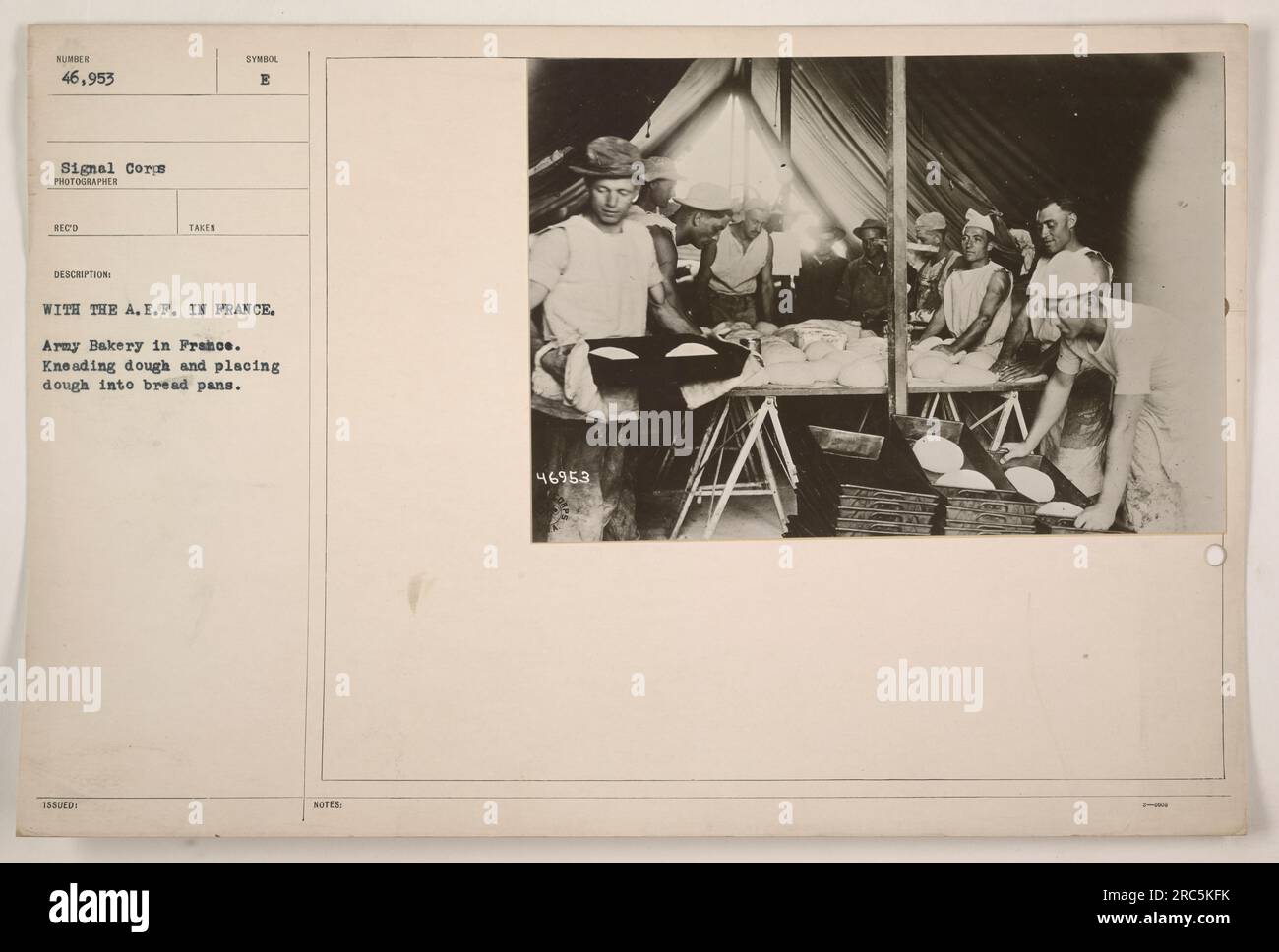 Soldiers at an army bakery in France are seen kneading dough and ...