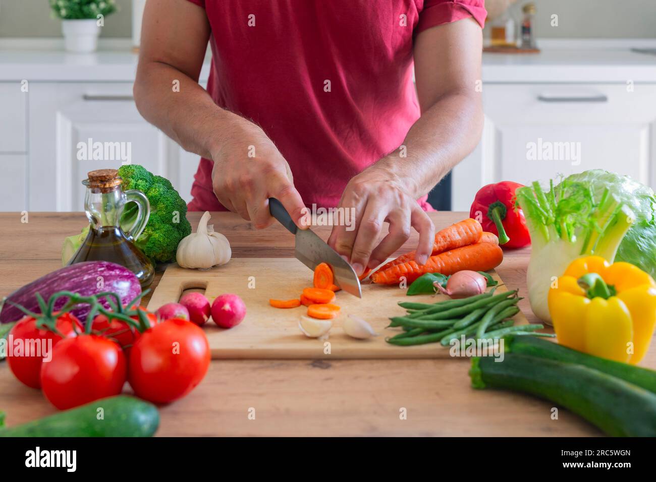 Person hands knife cutting hi-res stock photography and images - Alamy