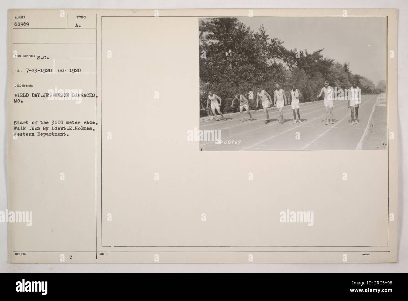 Participants start the 300 meter race walk during field day at ...