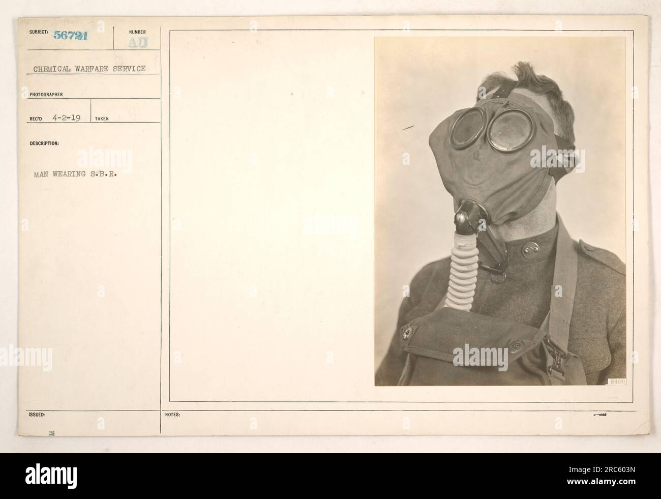 A man wearing a S.B.R (Small Box Respirator) is photographed during his ...
