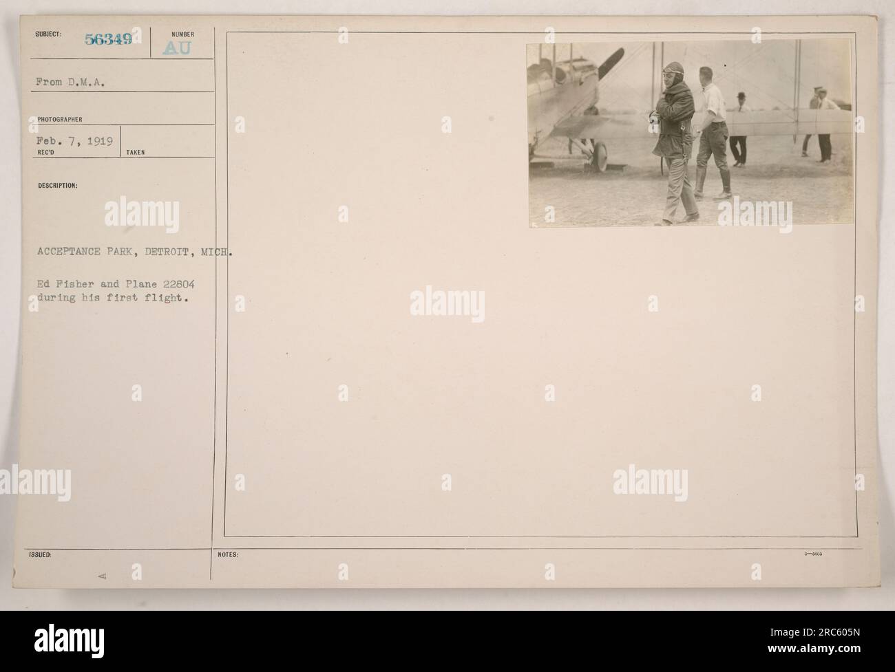 Ed Fisher takes Flight Ed Fisher and his plane, designated as 22804 ...